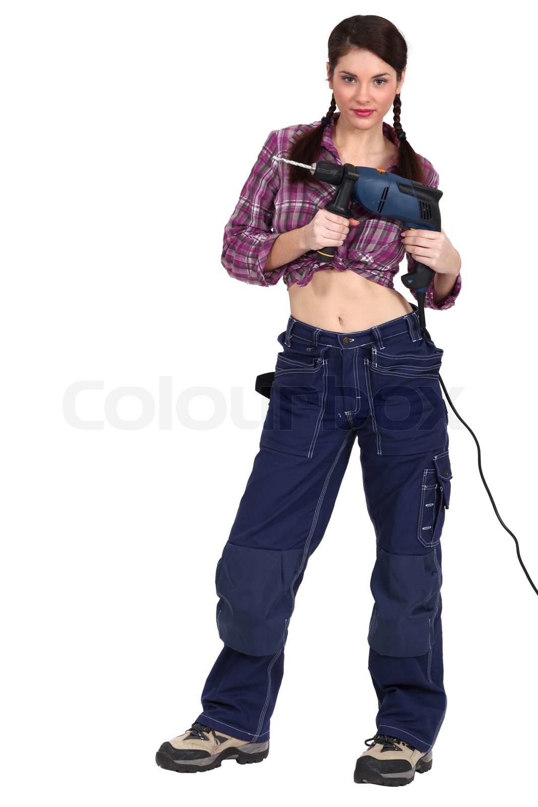 Woman with a powerdrill | Stock image | Colourbox