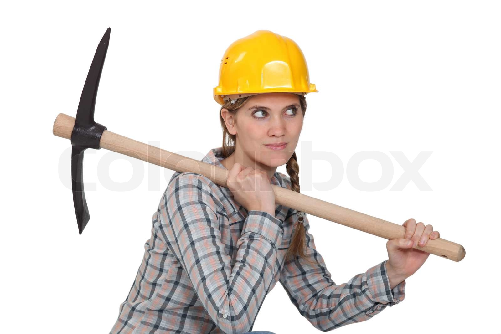 Female laborer posing with axe | Stock image | Colourbox
