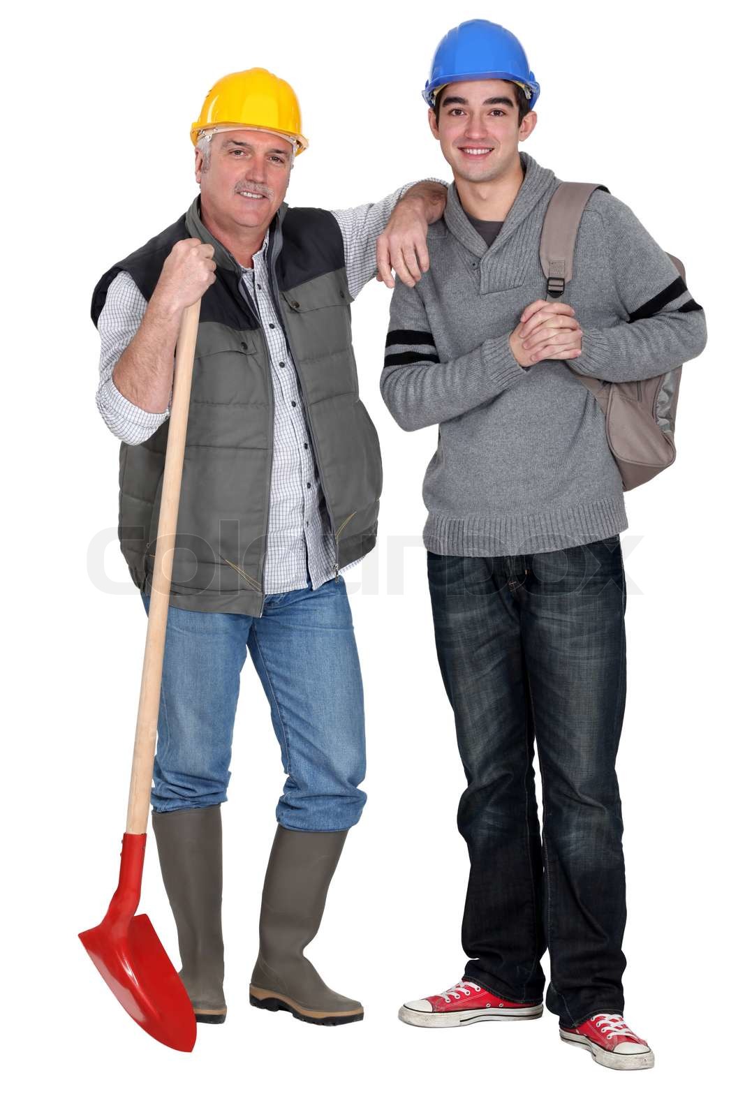 Experienced tradesman welcoming his new apprentice | Stock image ...