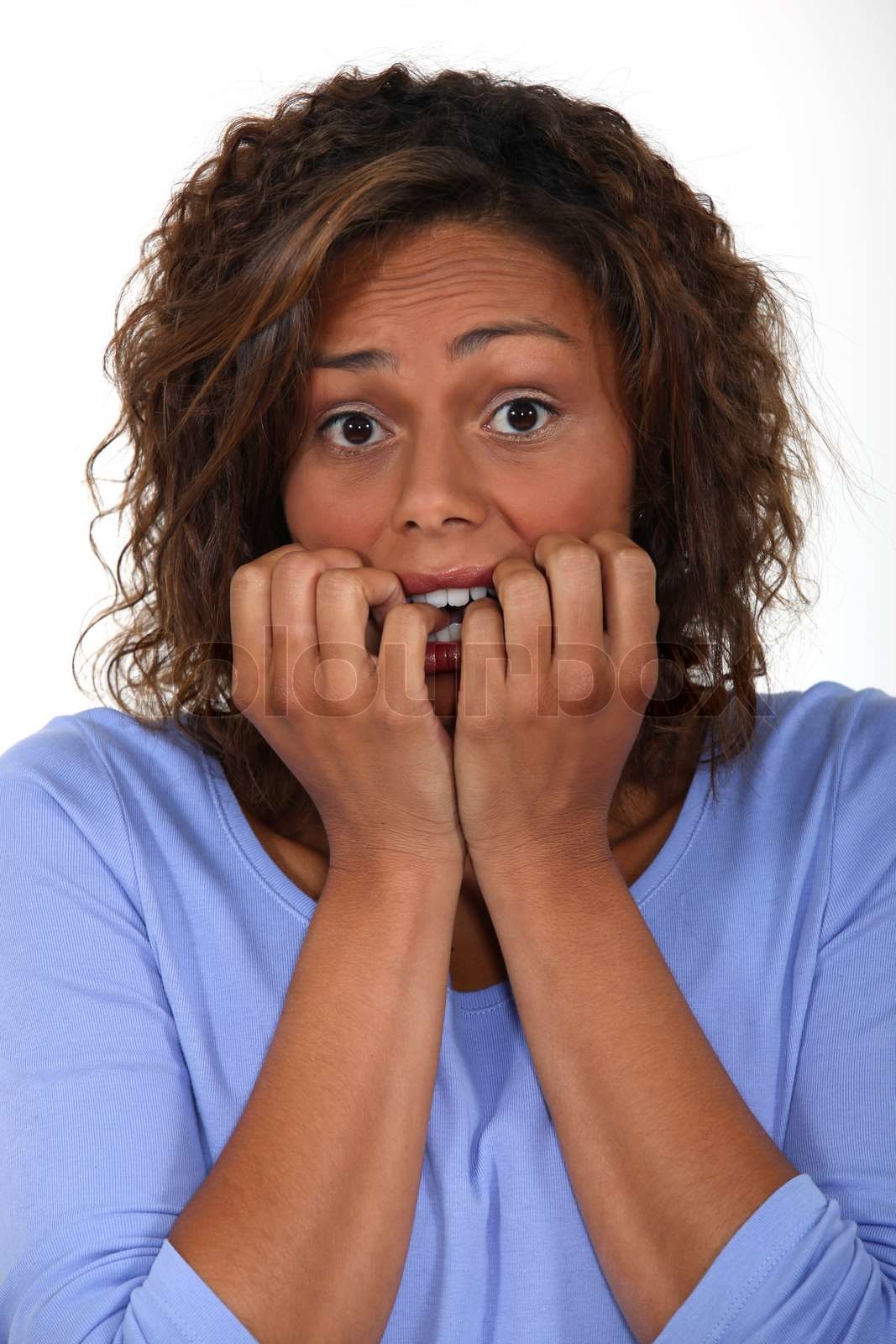 A fearful woman | Stock image | Colourbox