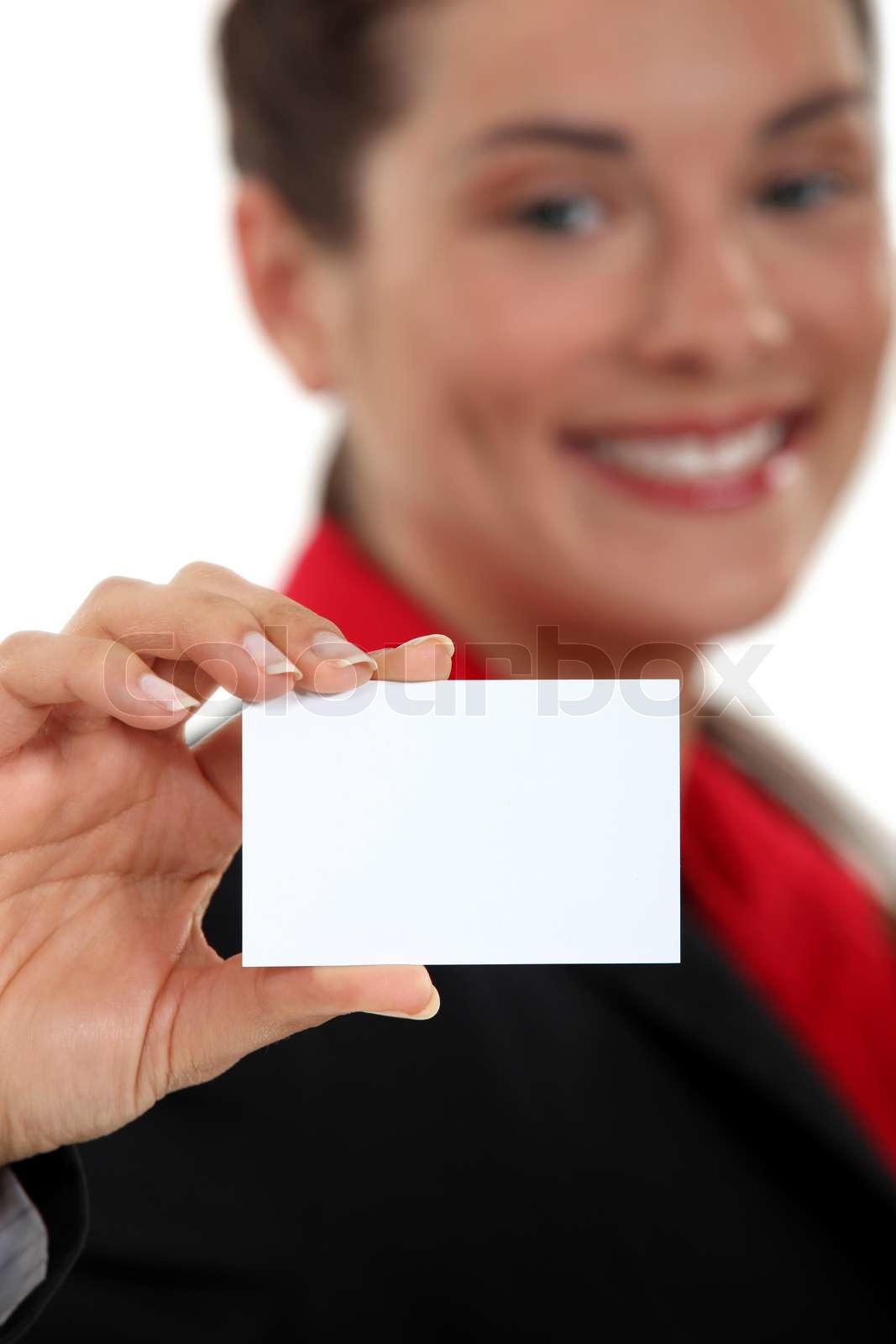 Businesswoman presenting card | Stock image | Colourbox