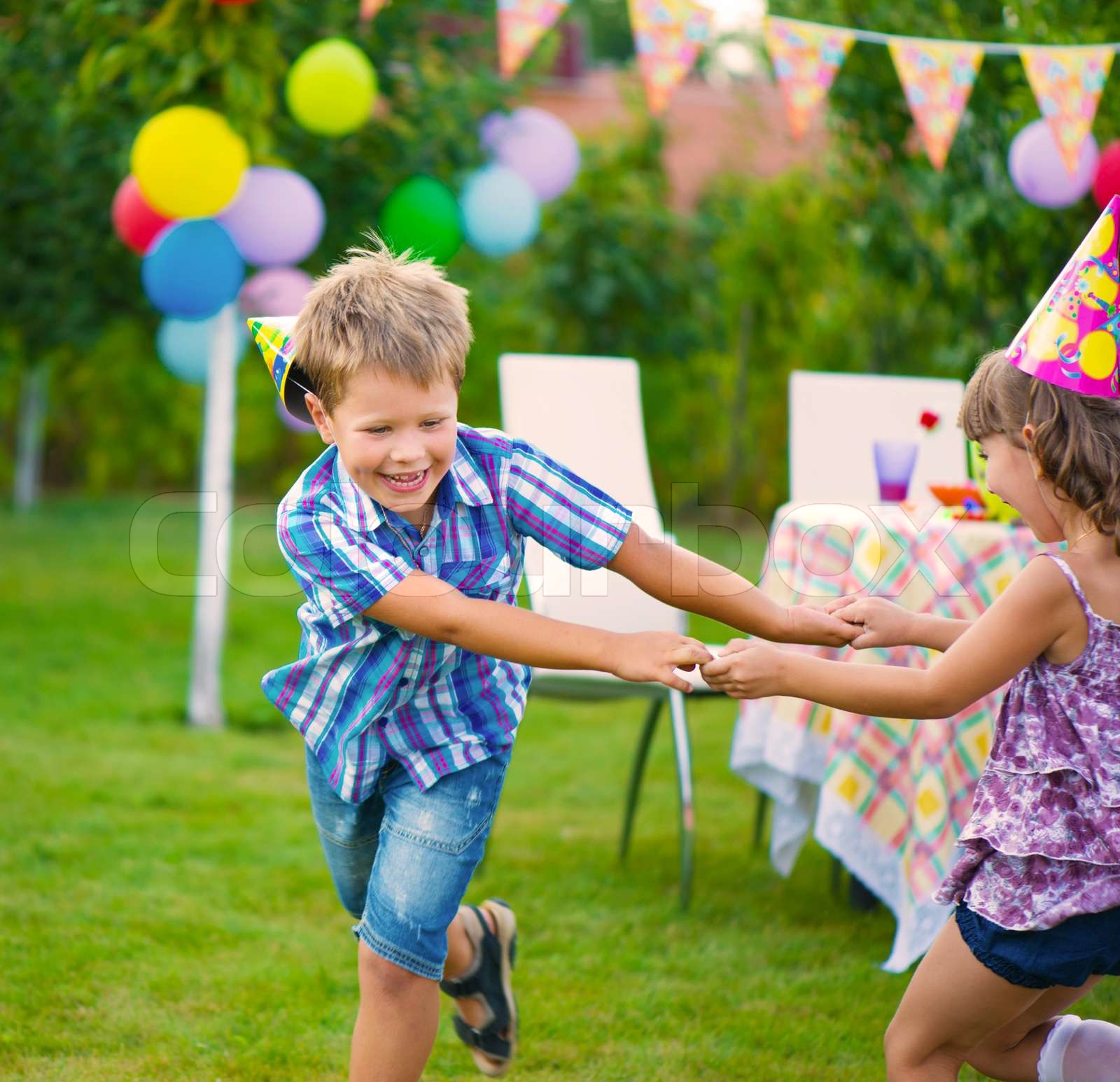 Two little kids dancing roundelay | Stock image | Colourbox