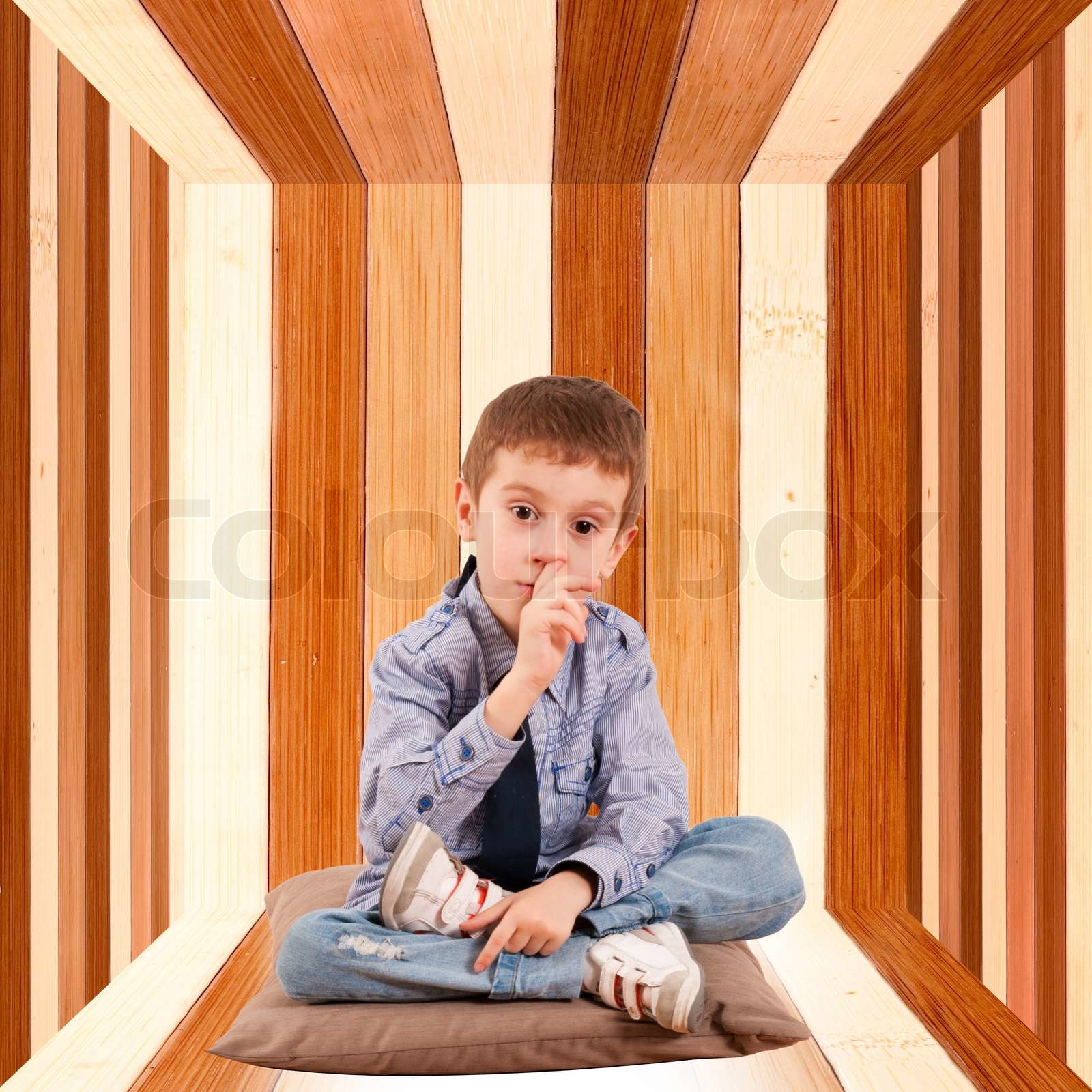 Kid in box | Stock image | Colourbox
