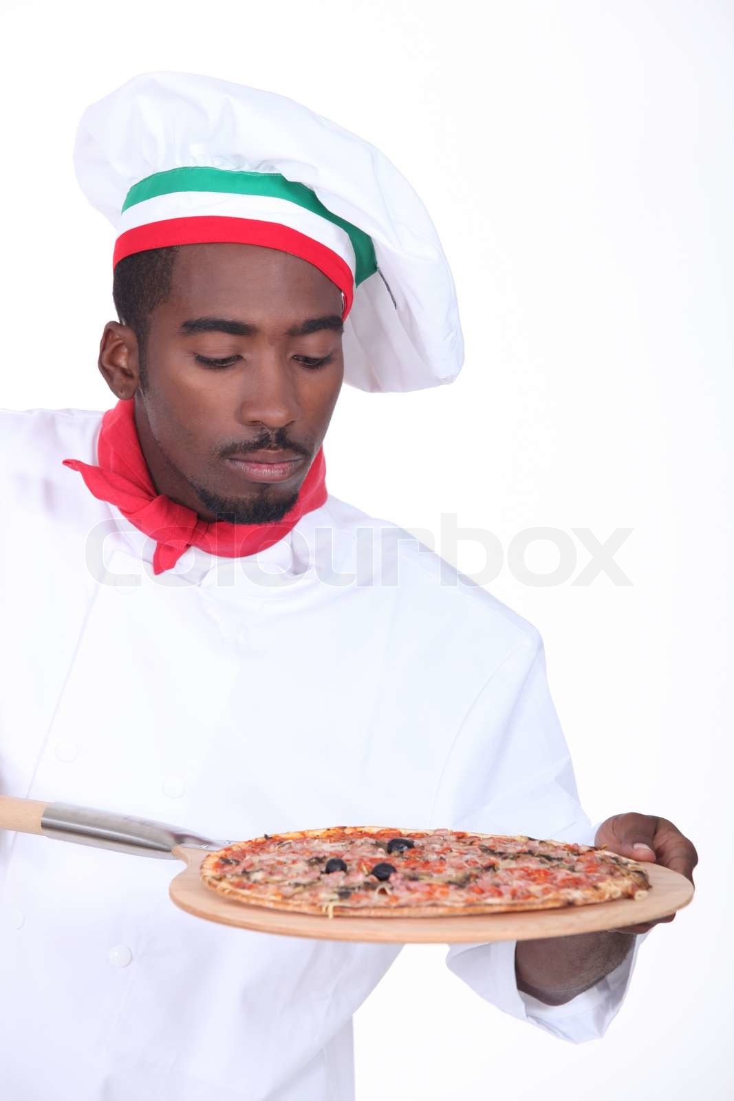 Pizza chef with an oven board | Stock image | Colourbox