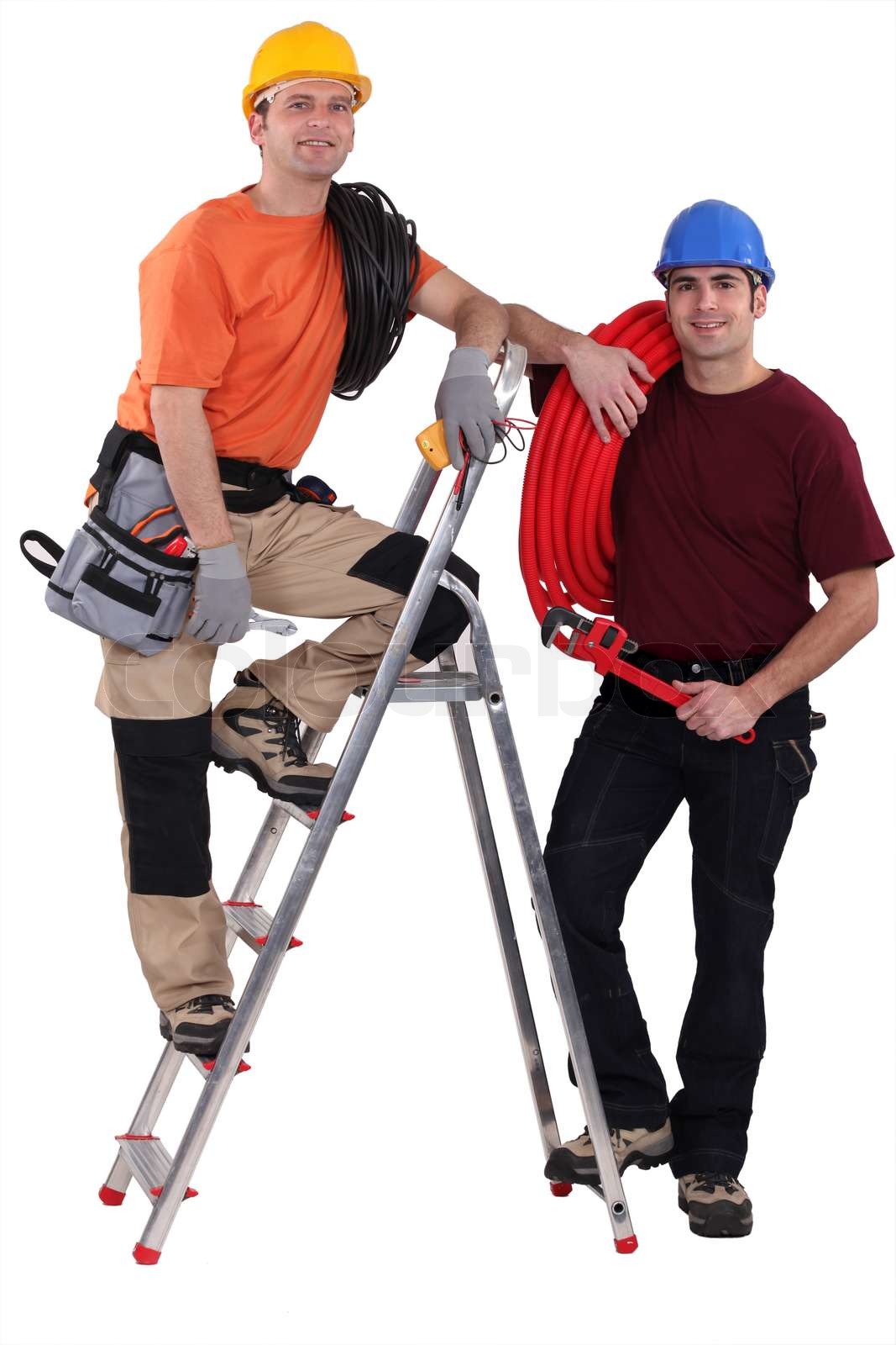 Ein Team von Handwerkern posieren mit ihren Werkzeugen | Stock Bild ...