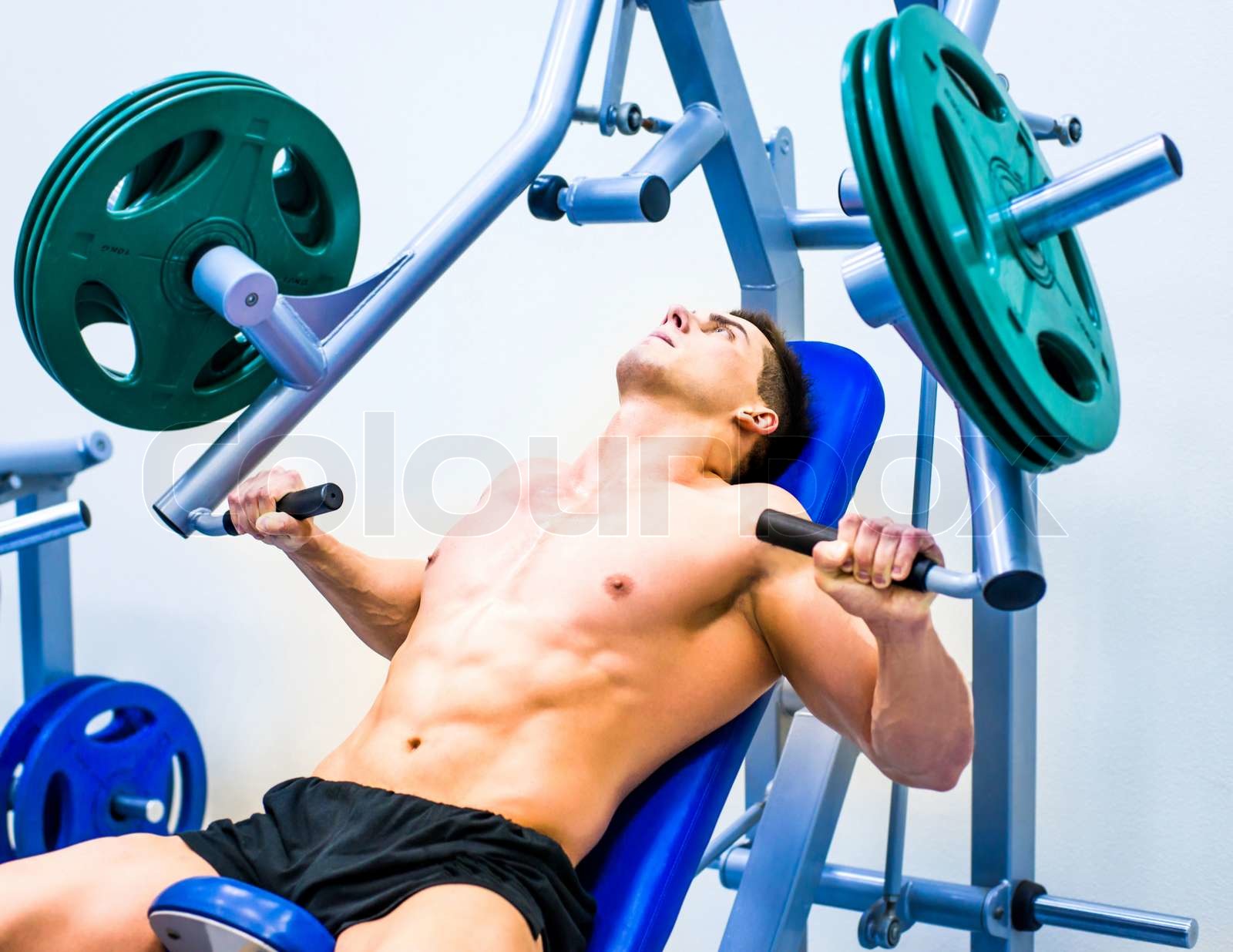 bodybuilder with simulator | Stock image | Colourbox