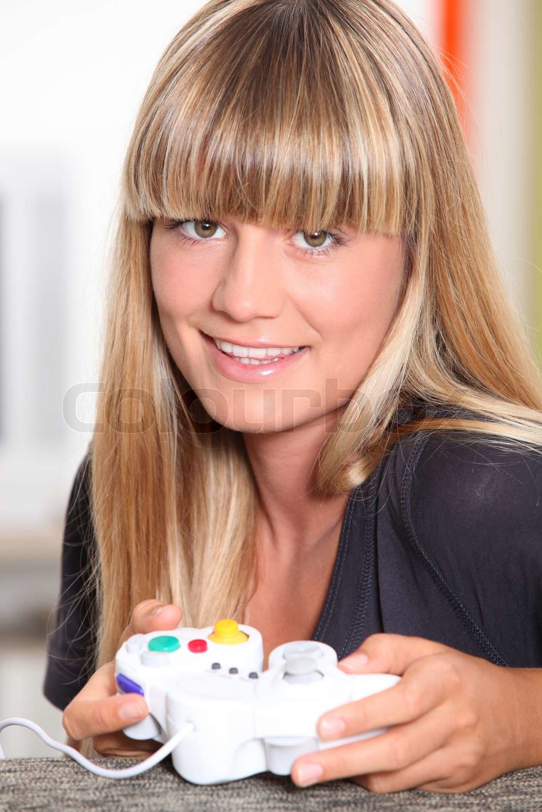 girl playing video games | Stock image | Colourbox