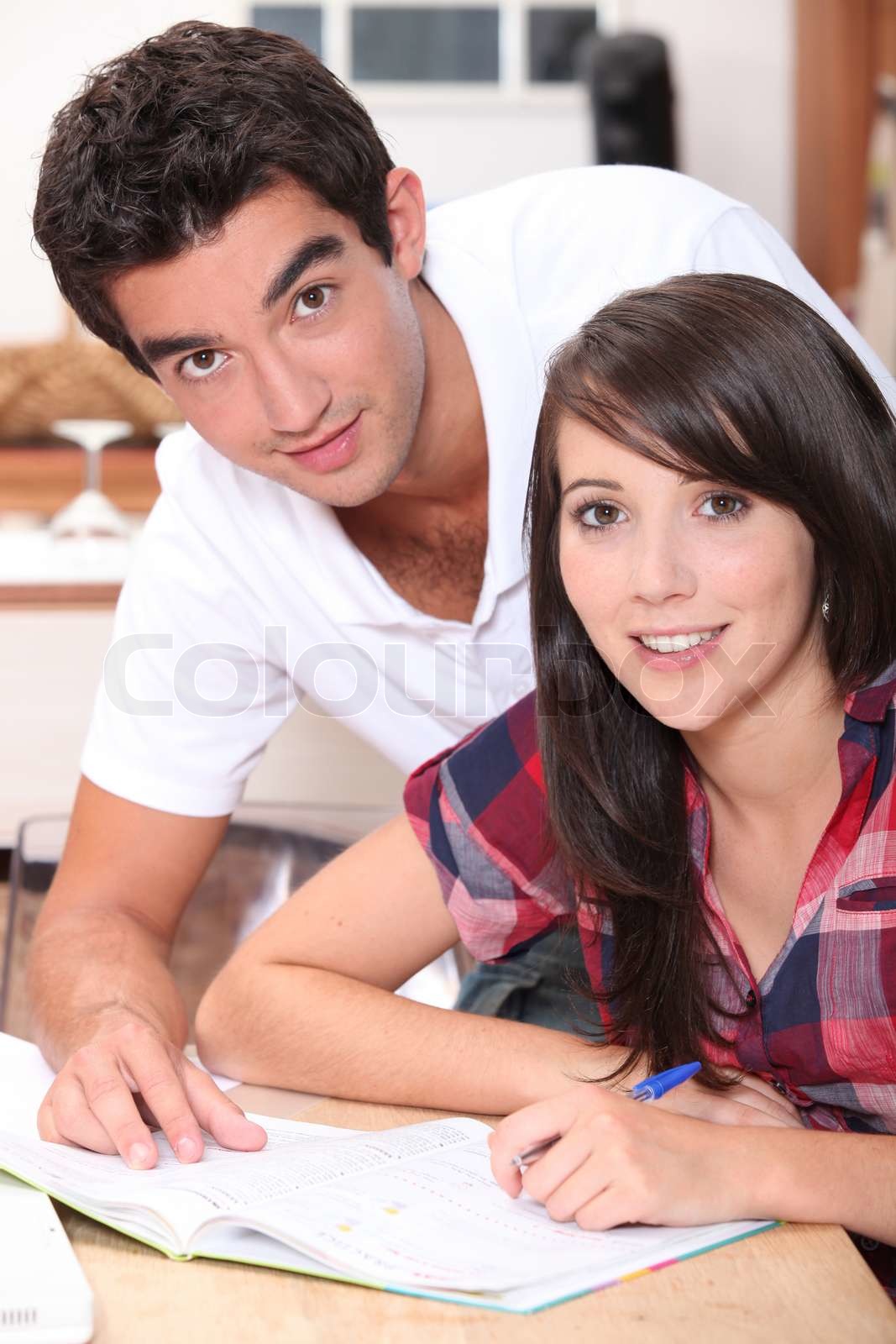 Teens doing homework | Stock image | Colourbox
