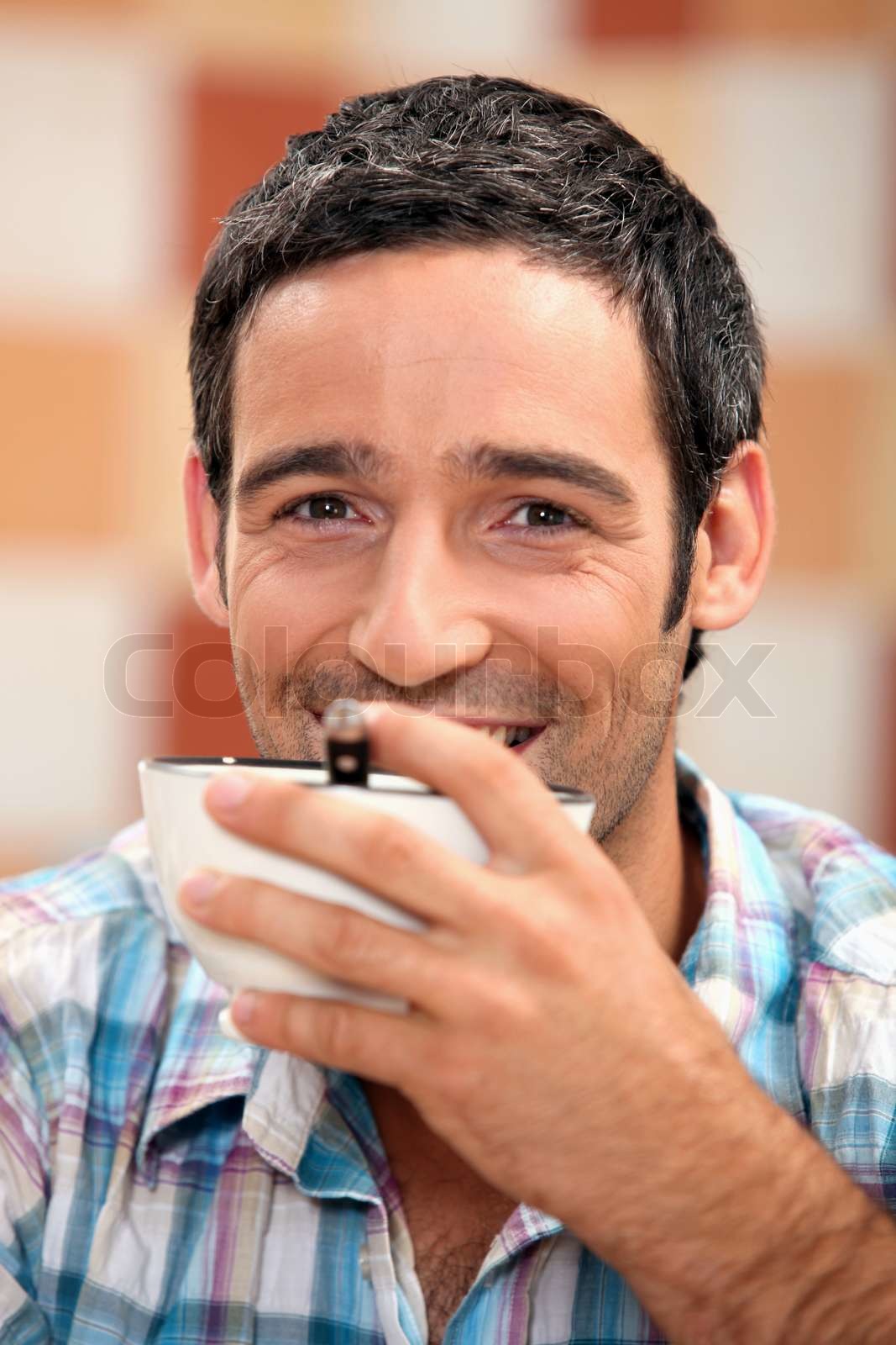 Man drinking coffee | Stock image | Colourbox