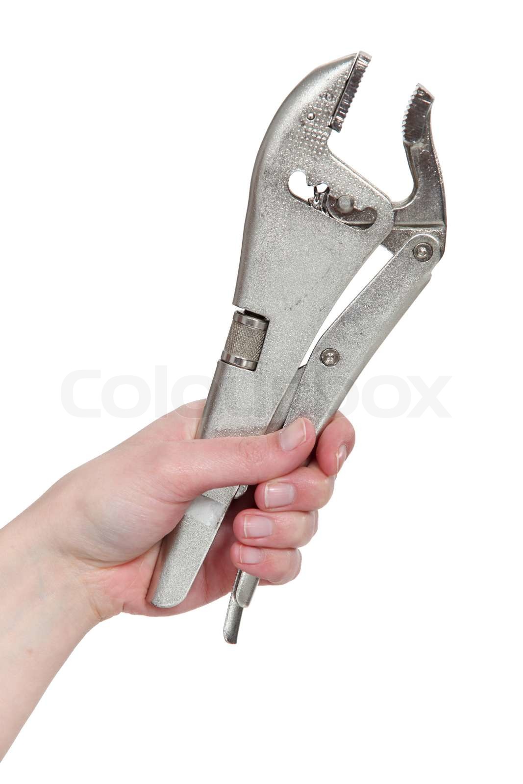 Hand mit Schraubenschlüssel | Stock Bild | Colourbox