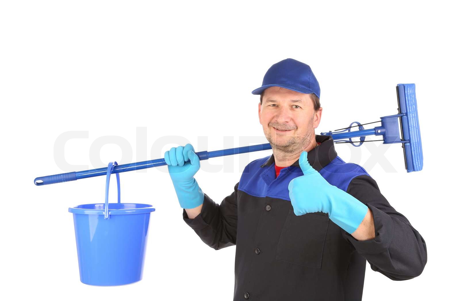 Man holder kost og spand | Stock foto | Colourbox
