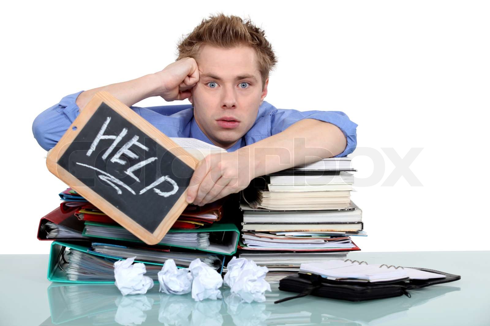 An overworked office worker | Stock image | Colourbox