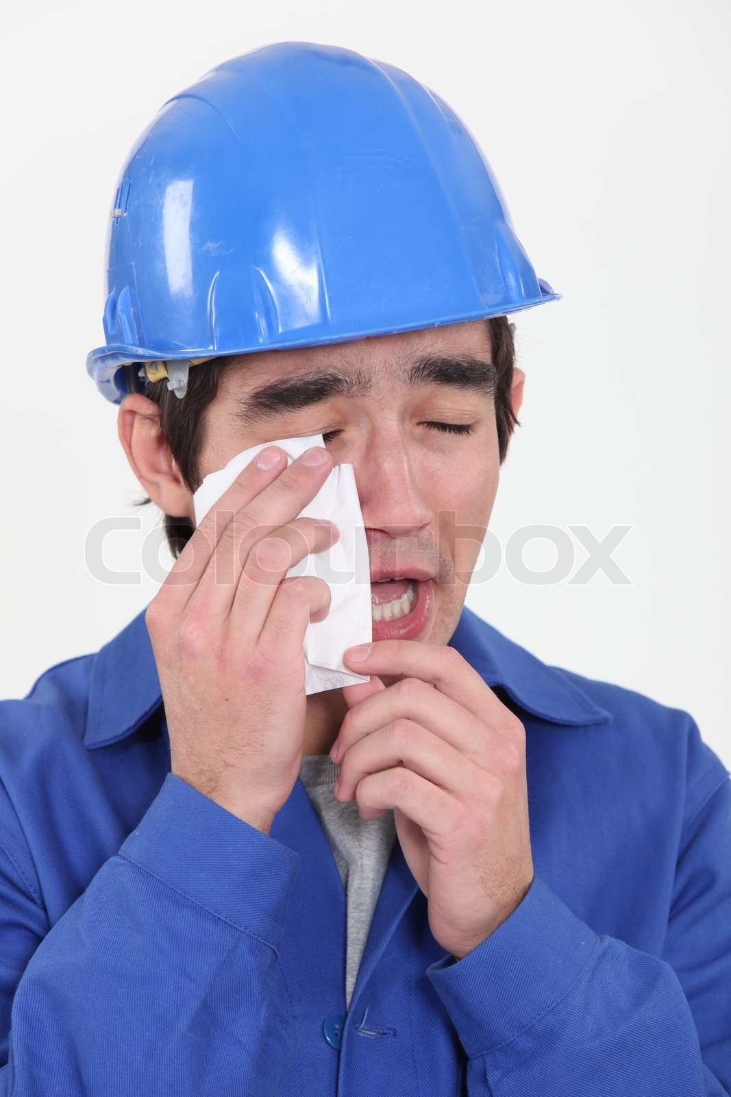 Construction worker crying | Stock image | Colourbox