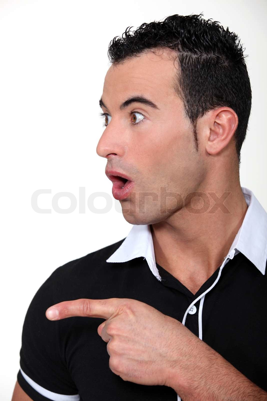 Man pointing at something | Stock image | Colourbox