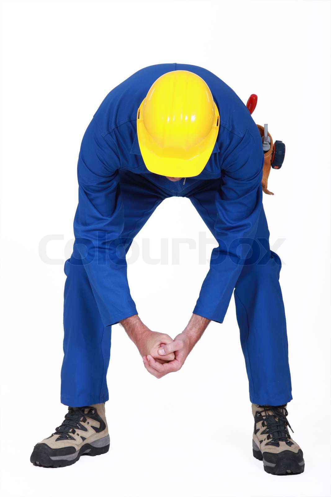 Worker bending over | Stock image | Colourbox
