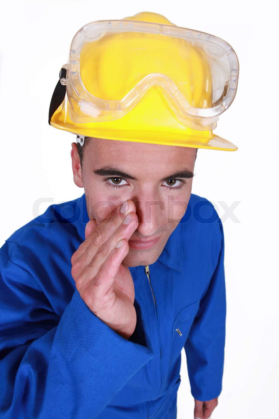 Worker wearing blue boiler suit | Stock image | Colourbox