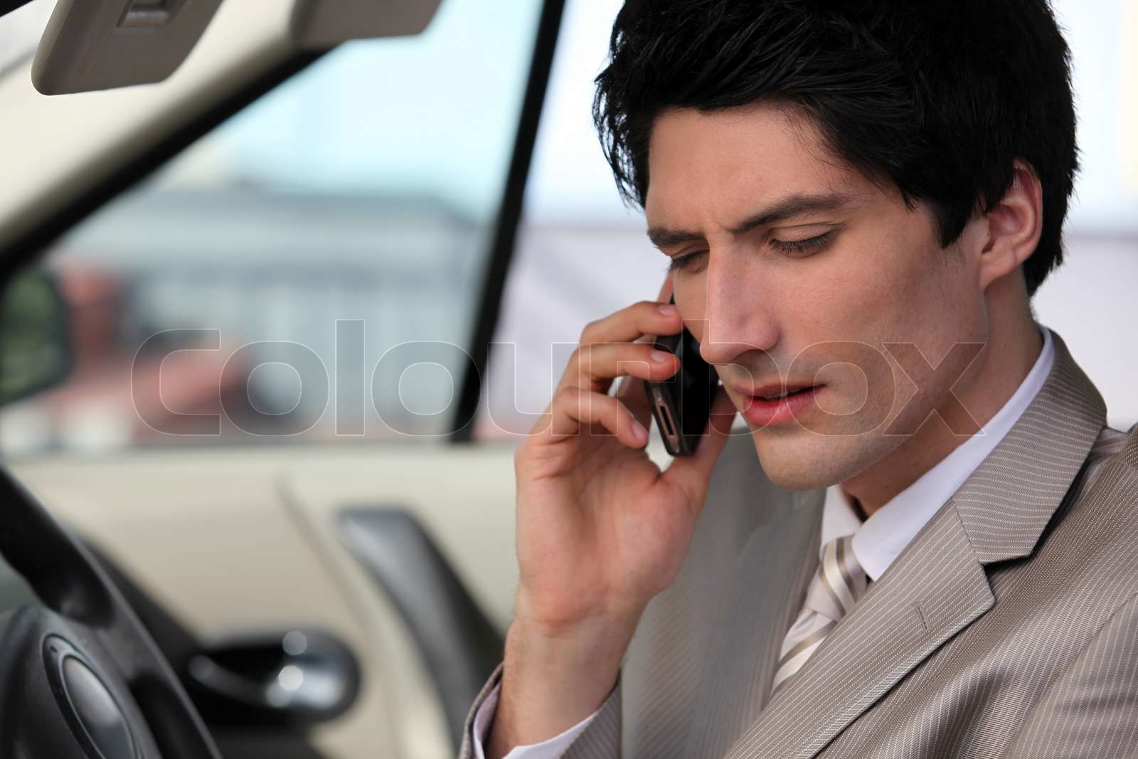 Businessman in his car | Stock image | Colourbox