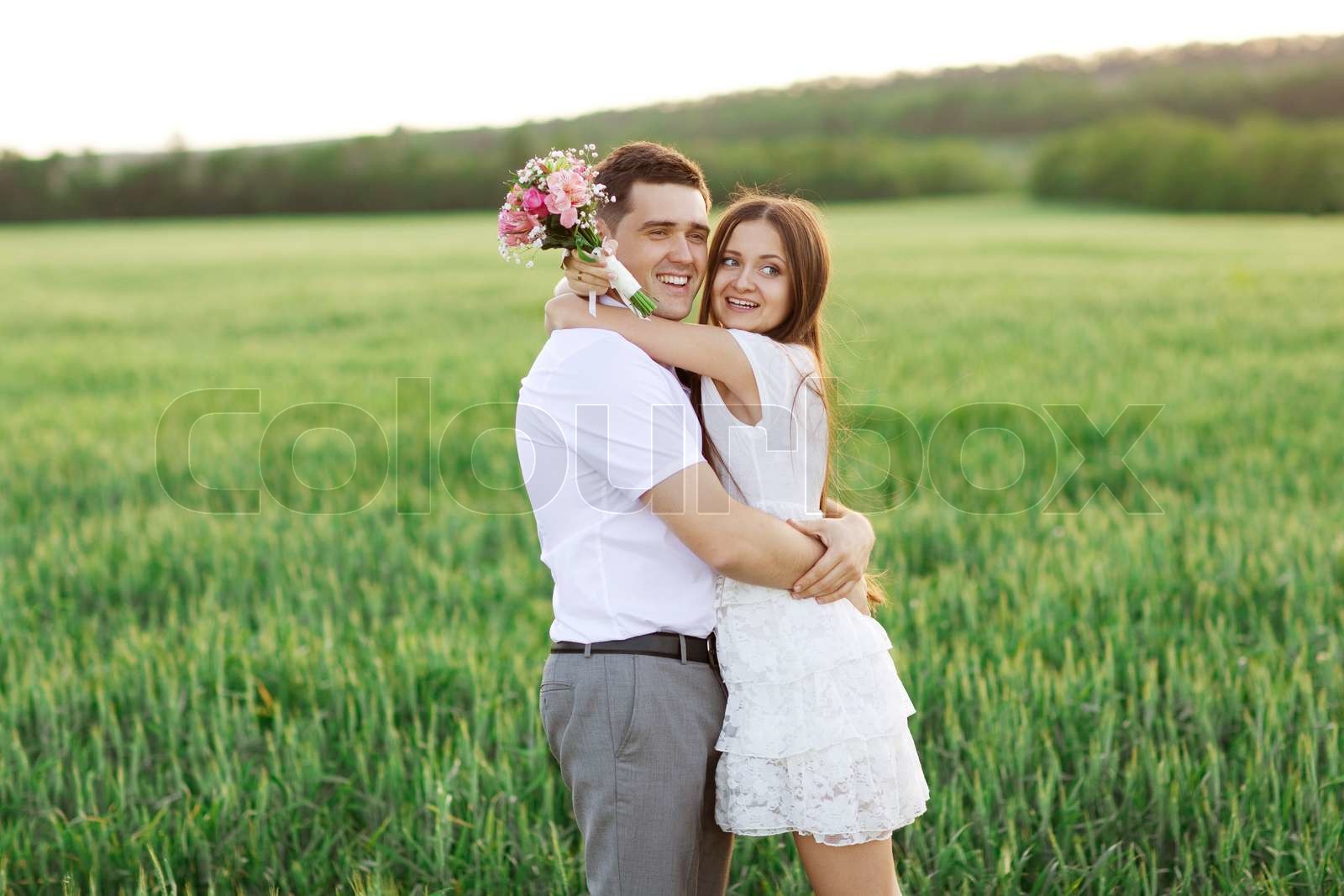 Just married couple hugging and smiling | Stock image | Colourbox