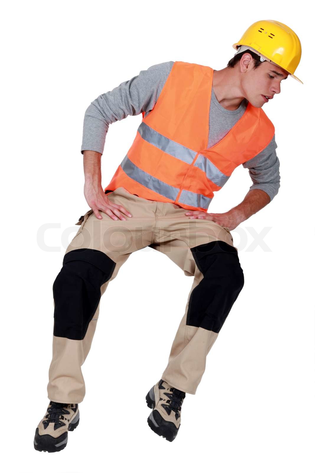 Construction worker looking down | Stock image | Colourbox