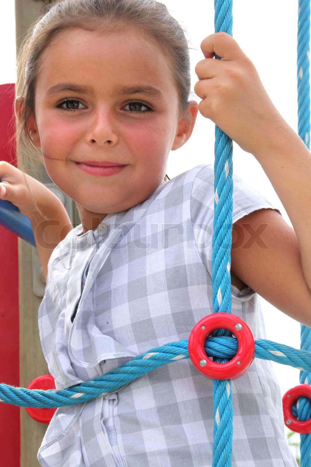Girl on climbing frame | Stock image | Colourbox