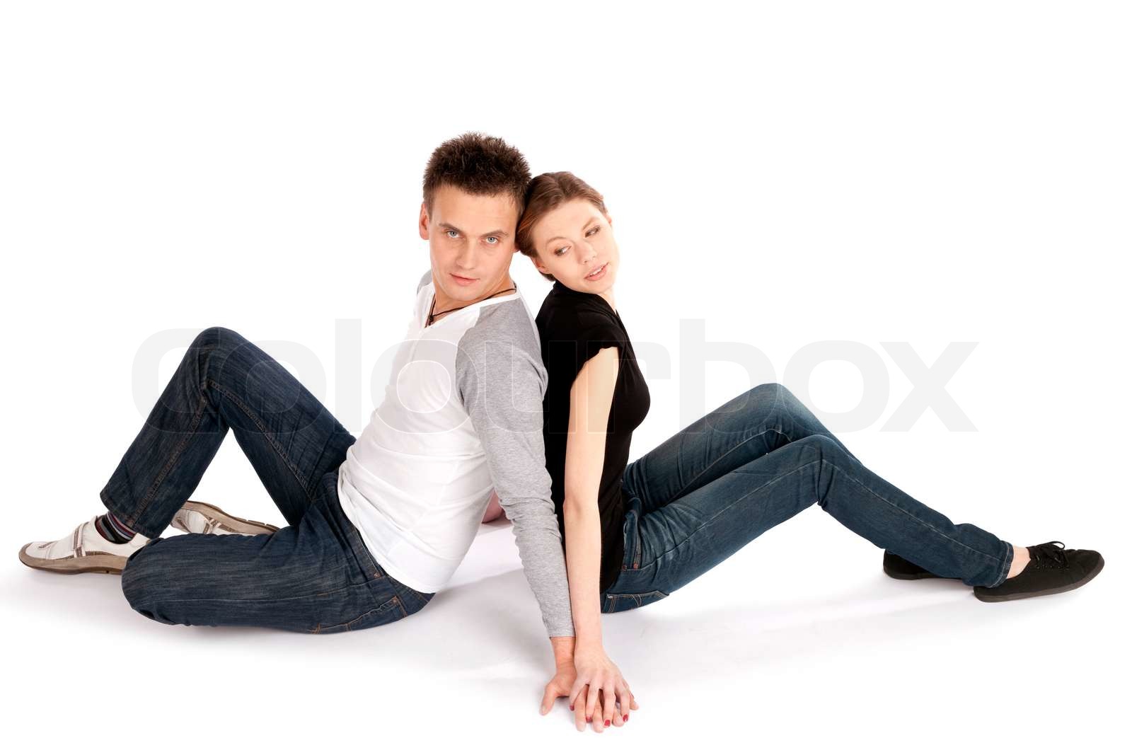 Couple Sitting Back To Back | Stock image | Colourbox