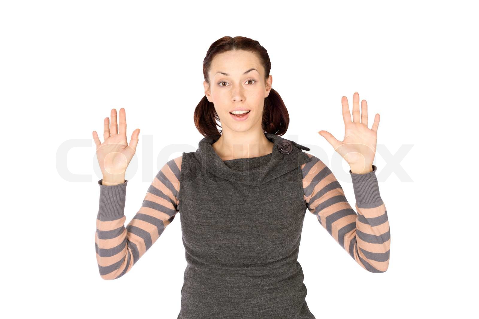 Excited Woman in Hands Up Pose | Stock image | Colourbox