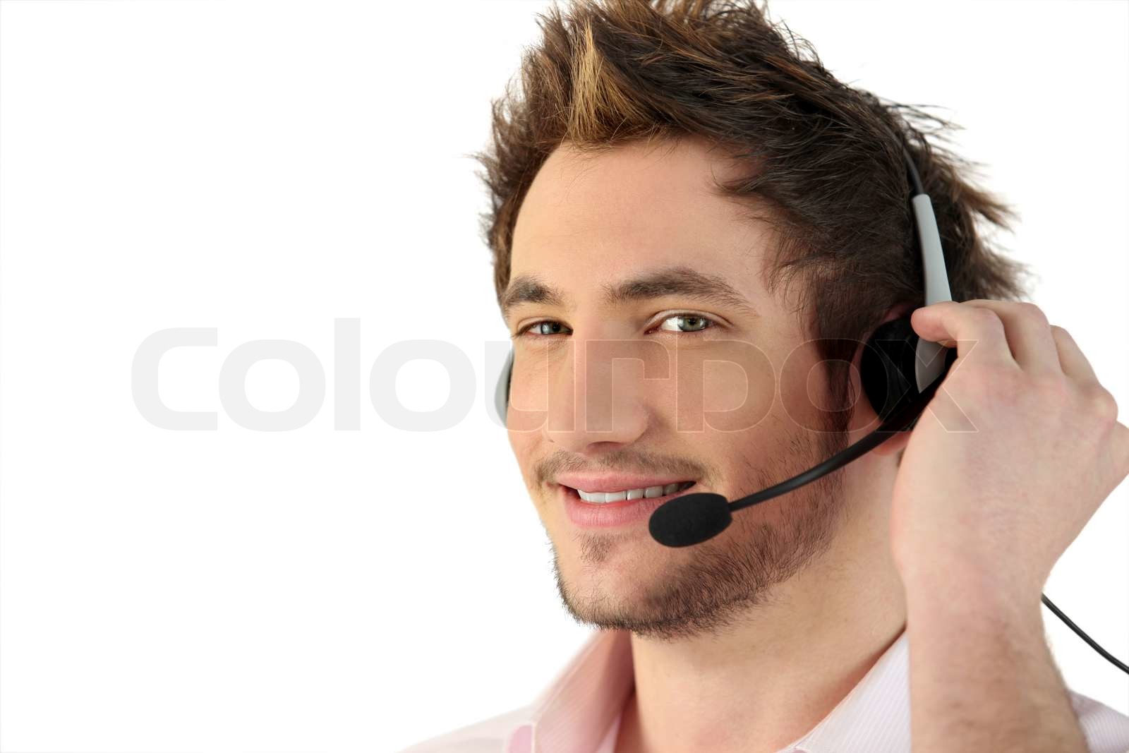Man wearing telephone head-set | Stock image | Colourbox
