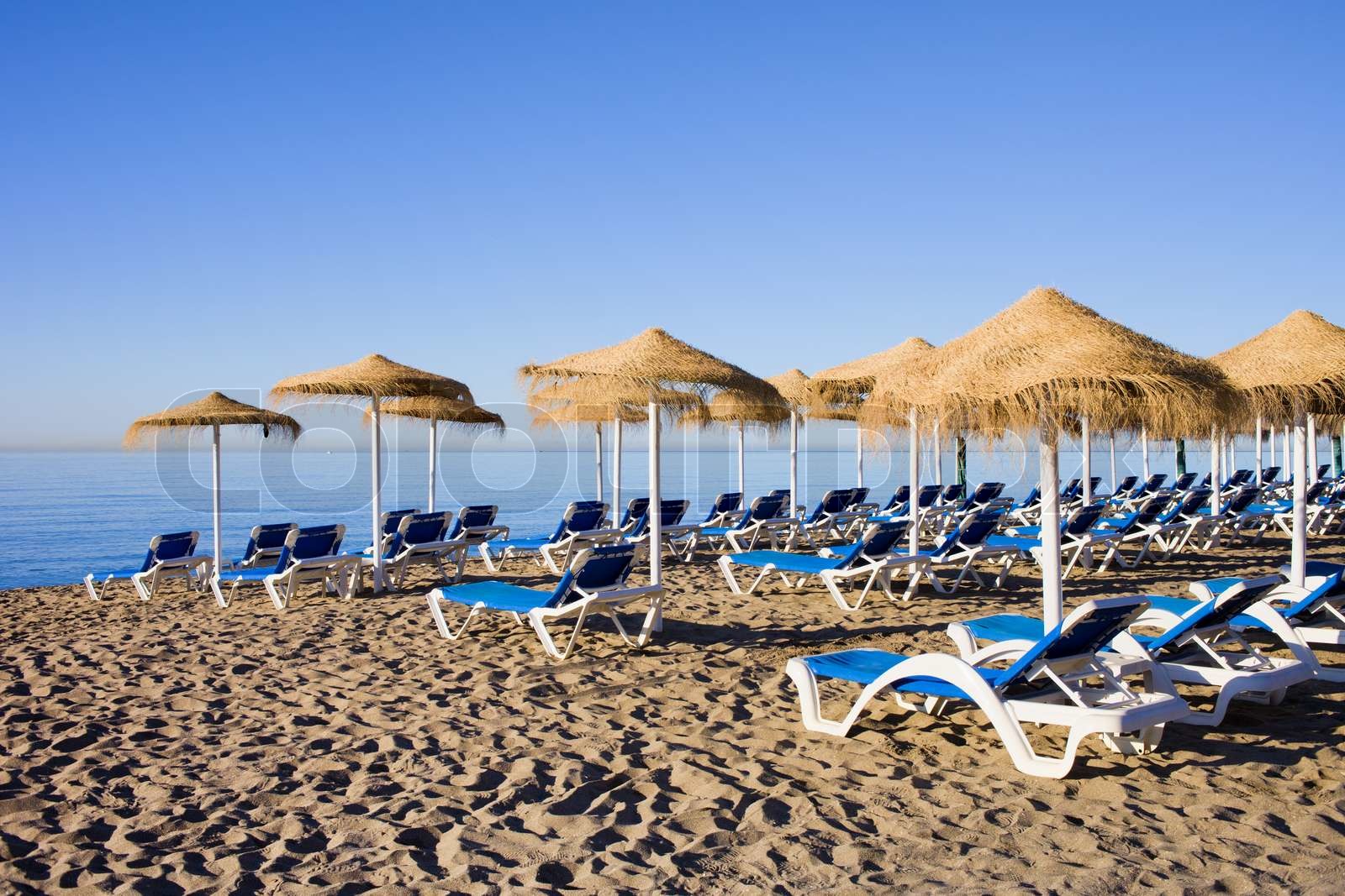 Sun Loungers on Marbella Beach | Stock image | Colourbox