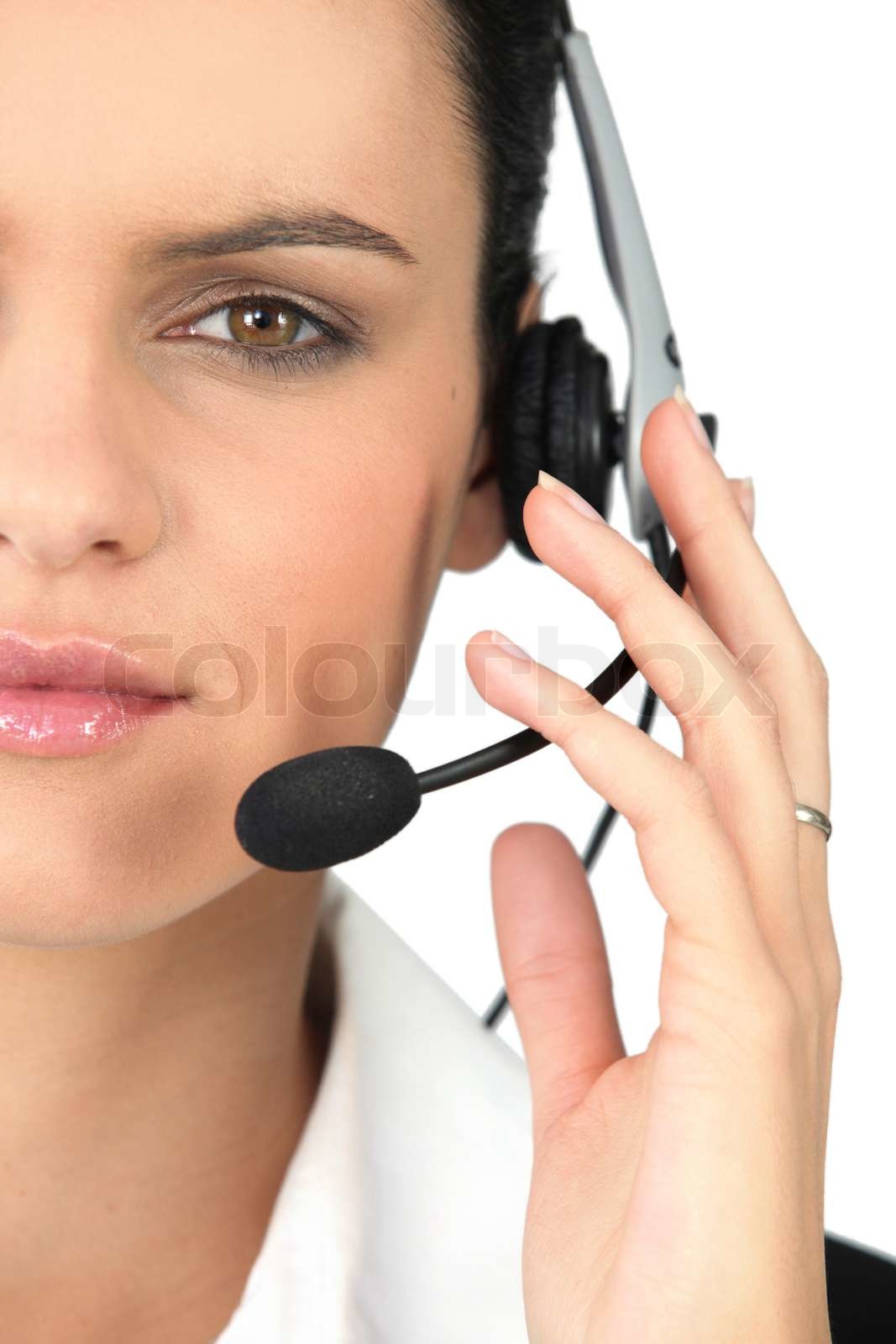 Secretary wearing a headset | Stock image | Colourbox