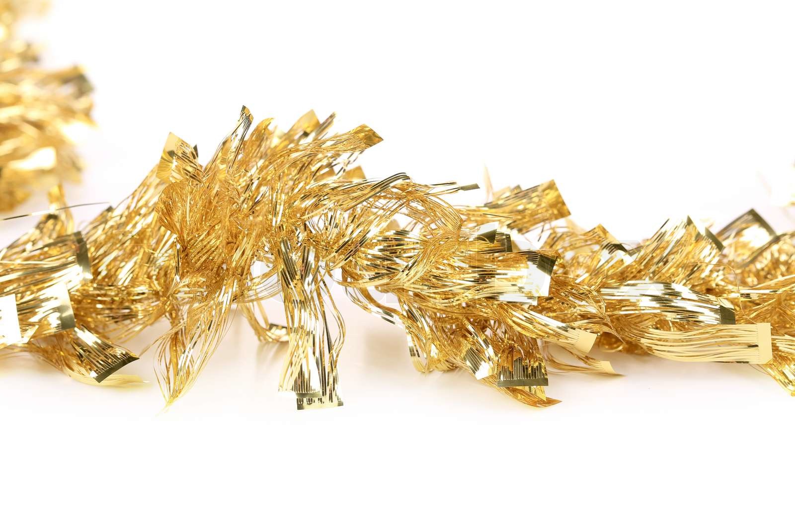 Christmas golden tinsel with stars. | Stock image | Colourbox