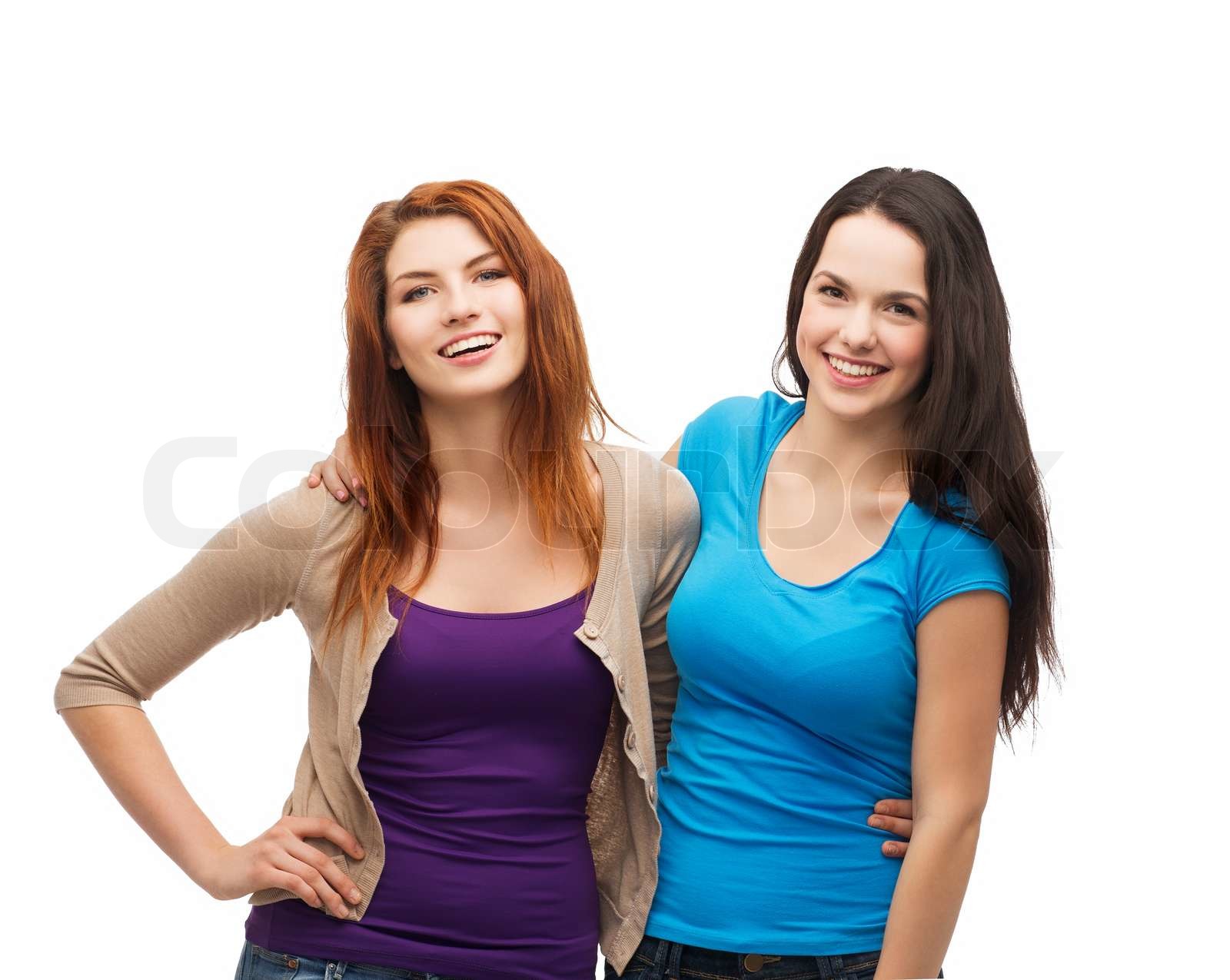 two laughing girls hugging | Stock image | Colourbox