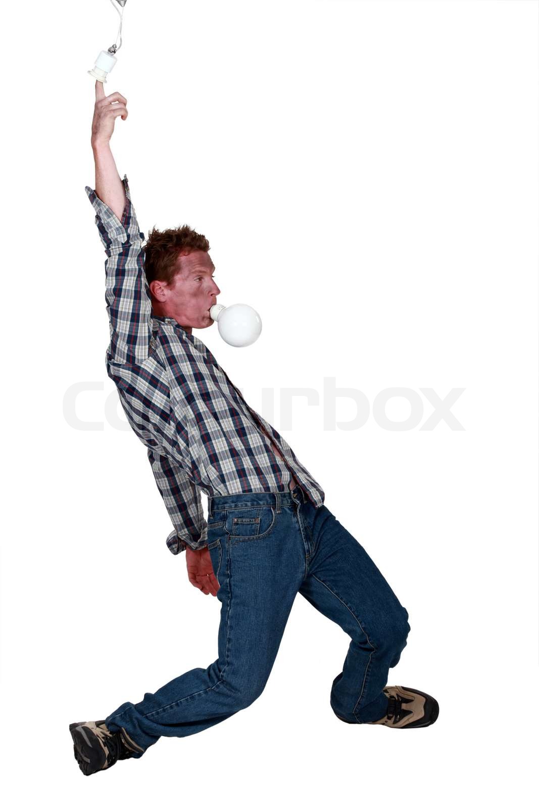 An electrocuted man staggering | Stock image | Colourbox