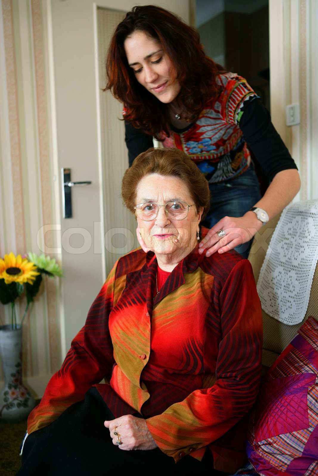 Woman helping old lady | Stock image | Colourbox