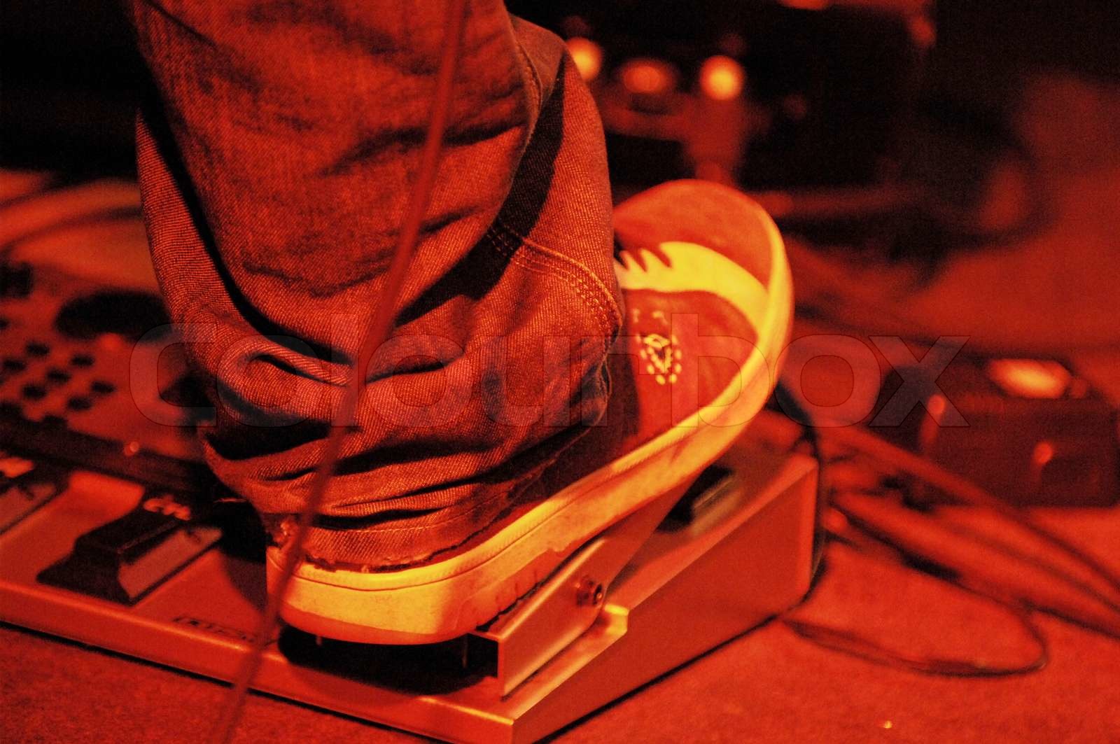 Close-up musicians foot on stage | Stock image | Colourbox