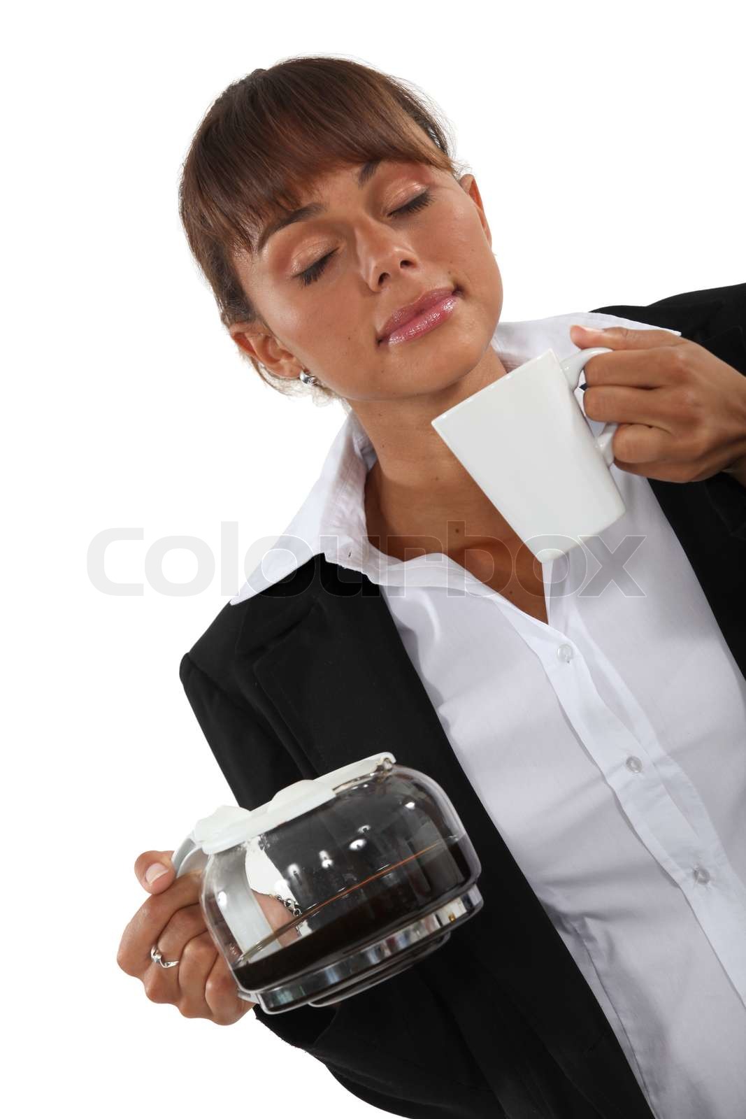 Woman smelling coffee | Stock image | Colourbox