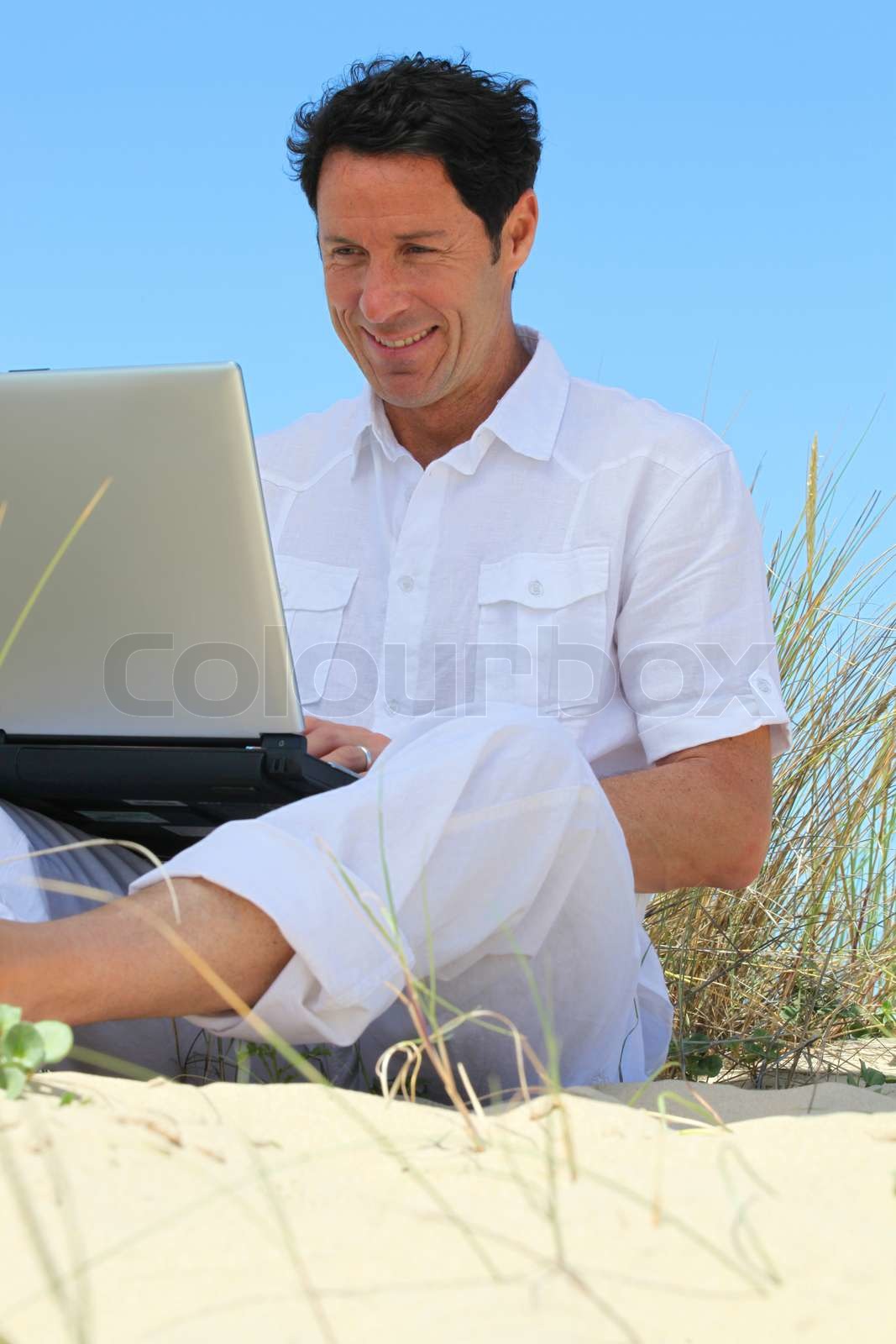 Man happy on the beach. | Stock image | Colourbox