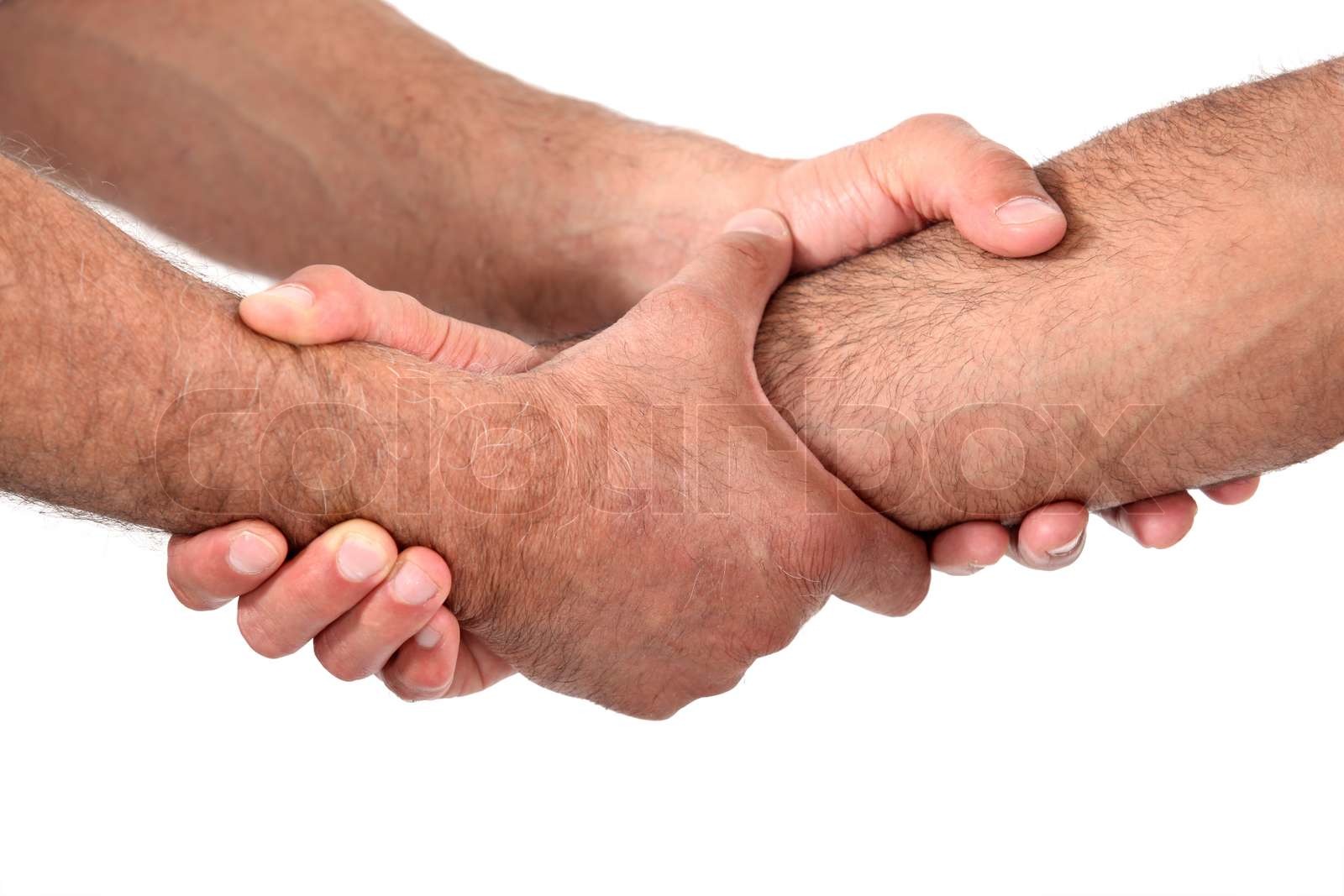 Double clasped handshake | Stock image | Colourbox