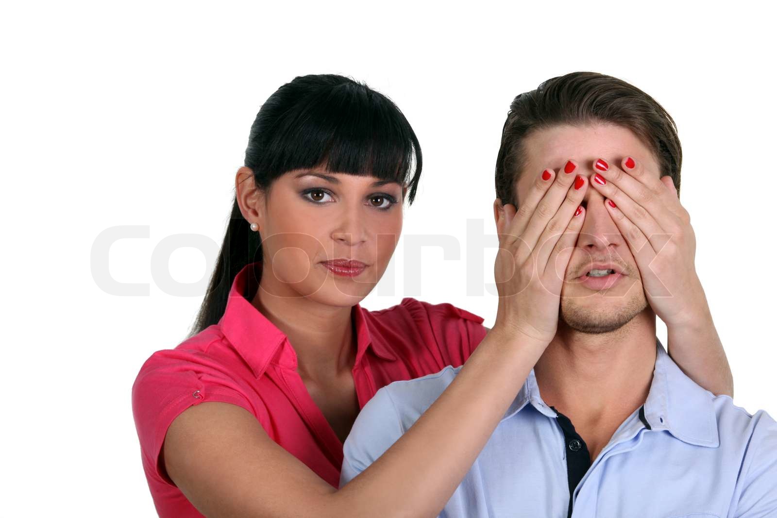 woman putting her hands on man eyes | Stock image | Colourbox