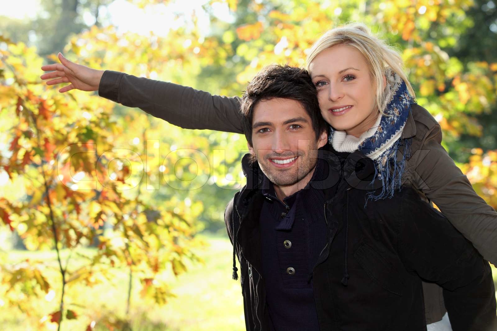 Woman on man's back | Stock image | Colourbox