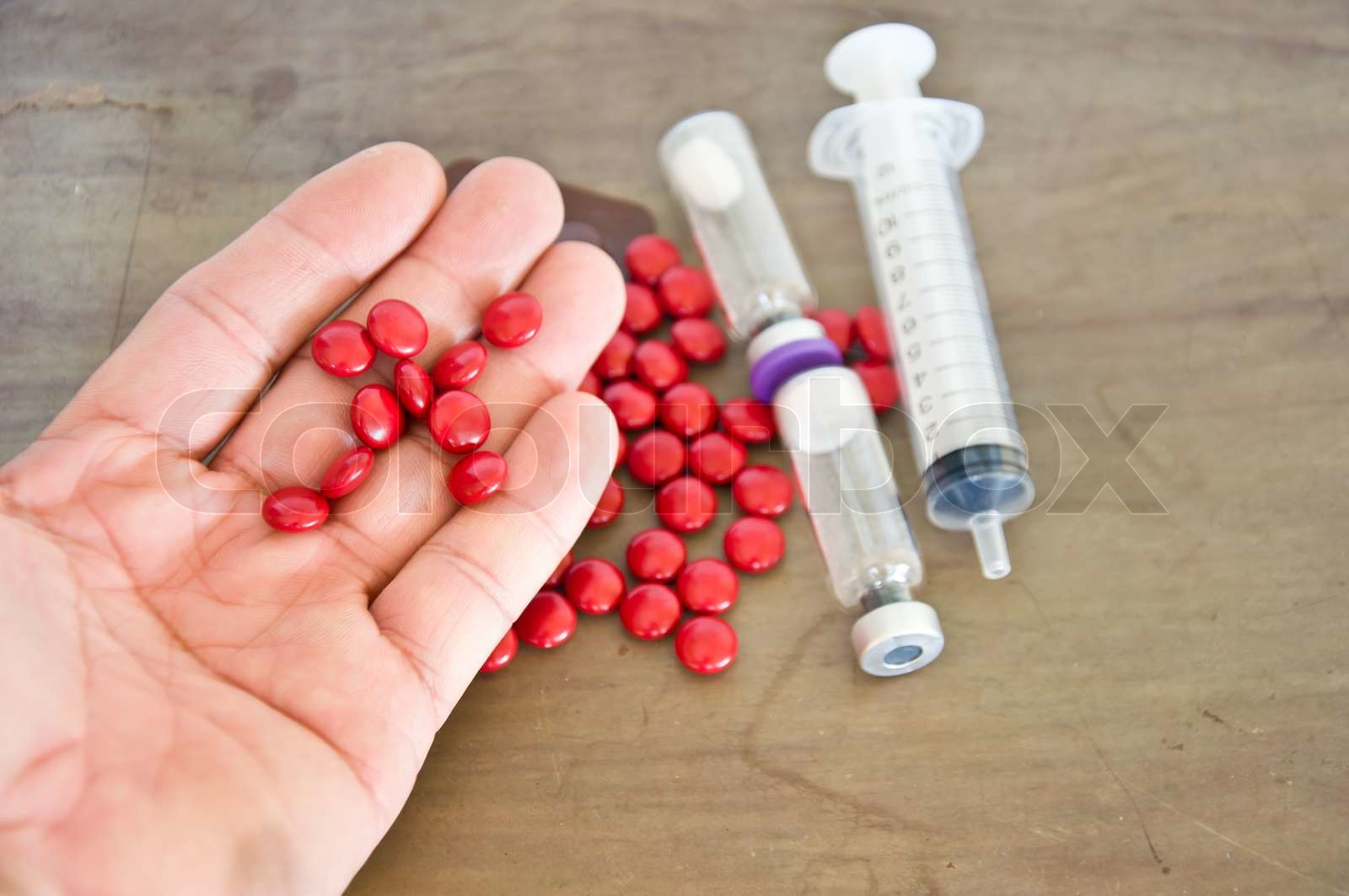 Red drug | Stock image | Colourbox