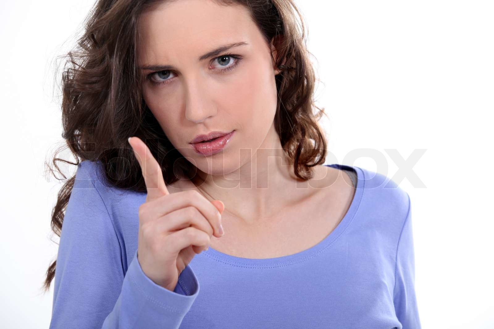 Woman wagging her finger | Stock image | Colourbox