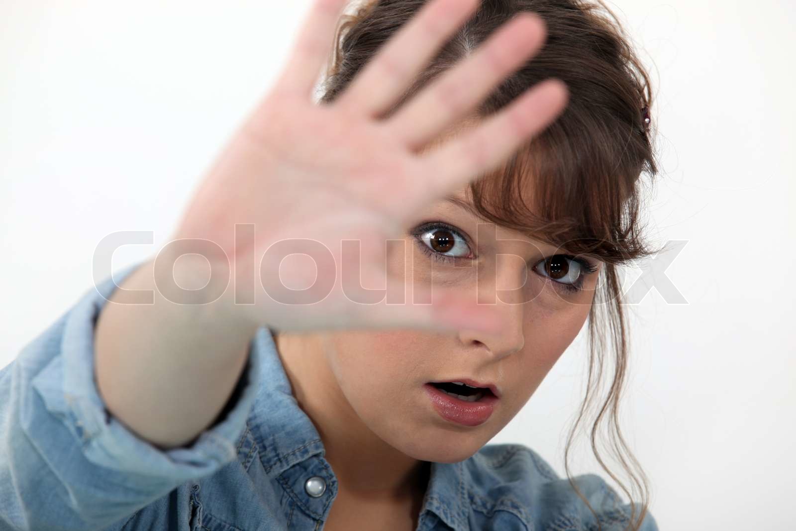 Woman hiding her face | Stock image | Colourbox
