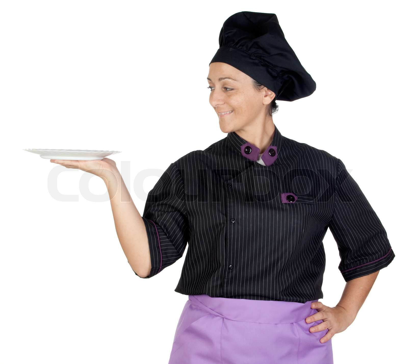 Pretty cook woman with black uniform | Stock image | Colourbox