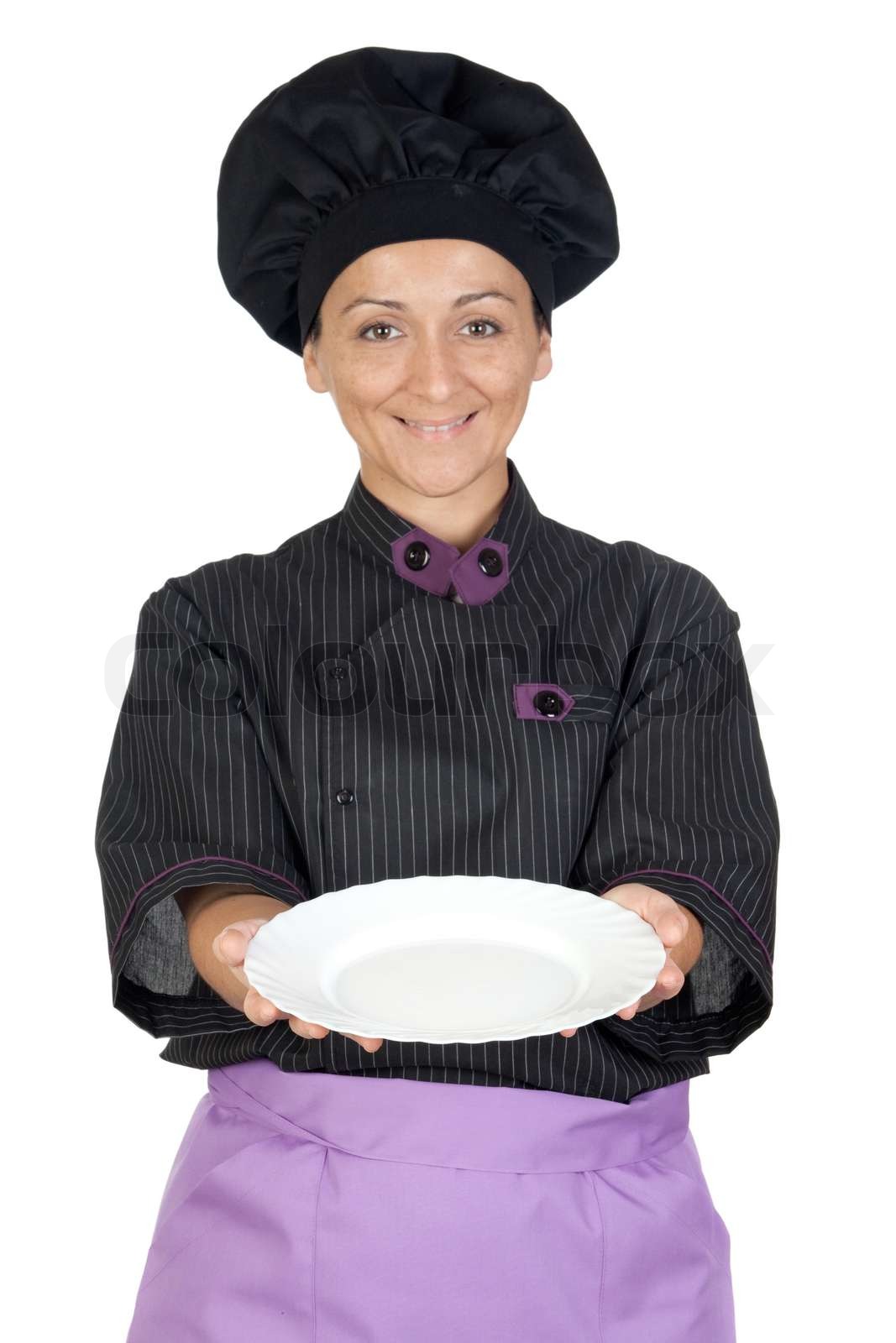 Pretty cook woman with black uniform | Stock image | Colourbox