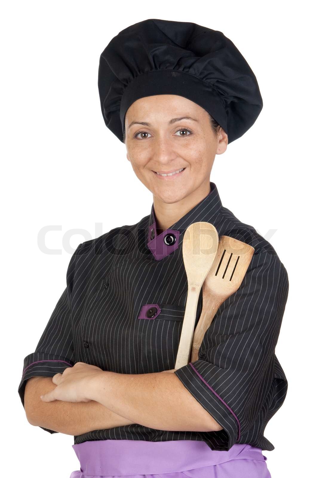 Pretty cook girl with wooden cookware | Stock image | Colourbox