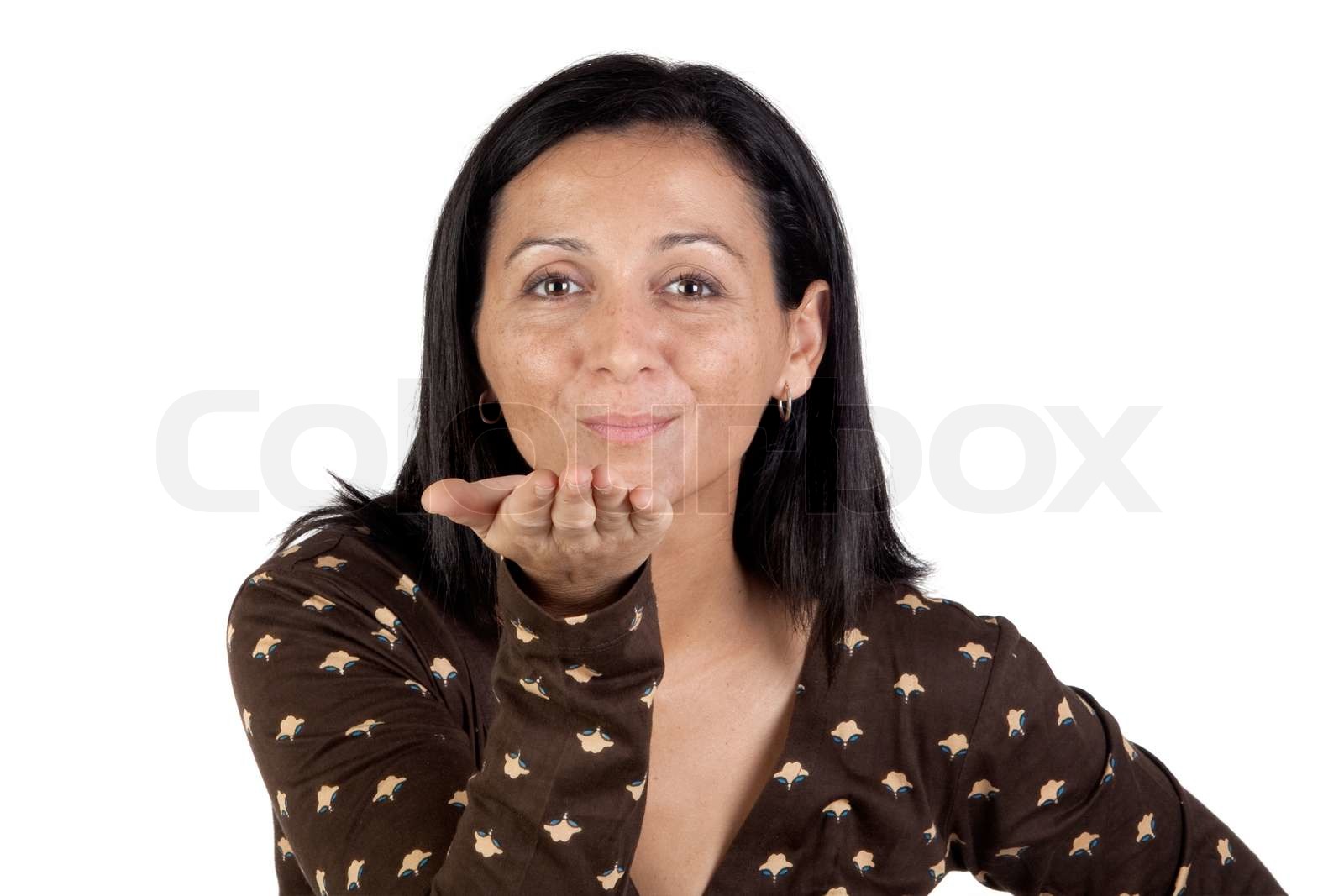 Pretty brown girl throwing a kiss | Stock image | Colourbox