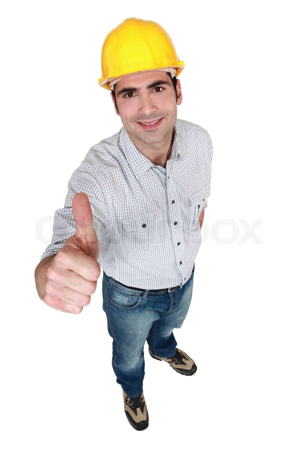 Construction worker giving the thumb's up | Stock image | Colourbox
