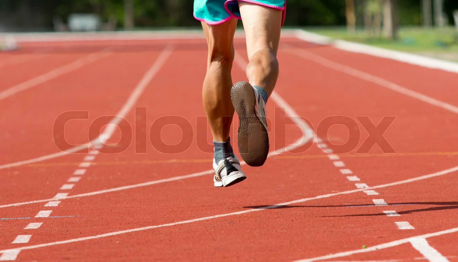 athlete running in track | Stock image | Colourbox