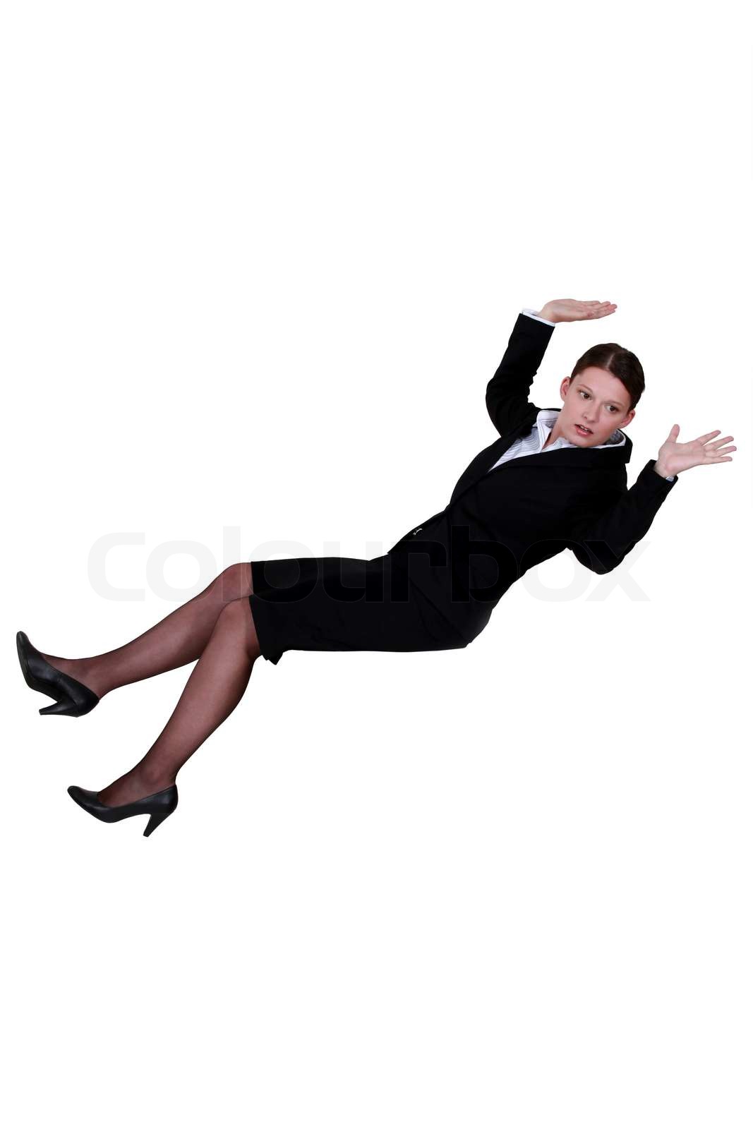 Businesswoman falling backwards | Stock image | Colourbox