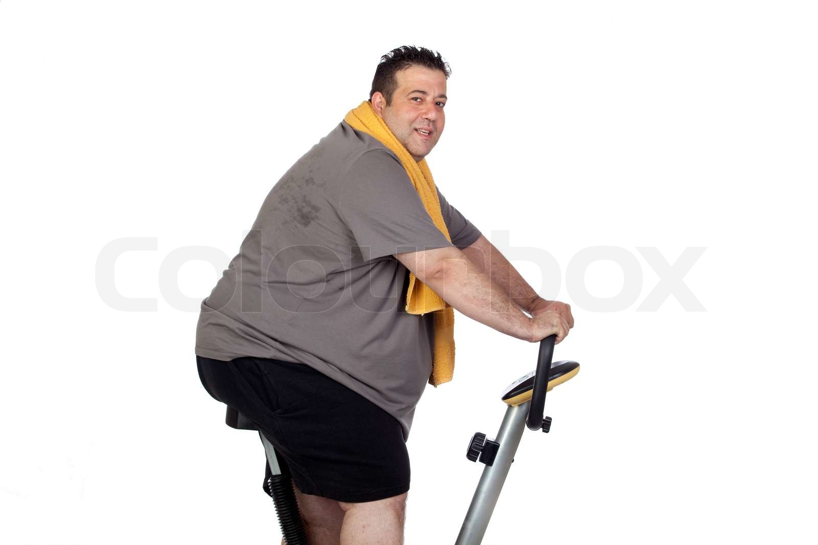 Fat man playing sport | Stock image | Colourbox